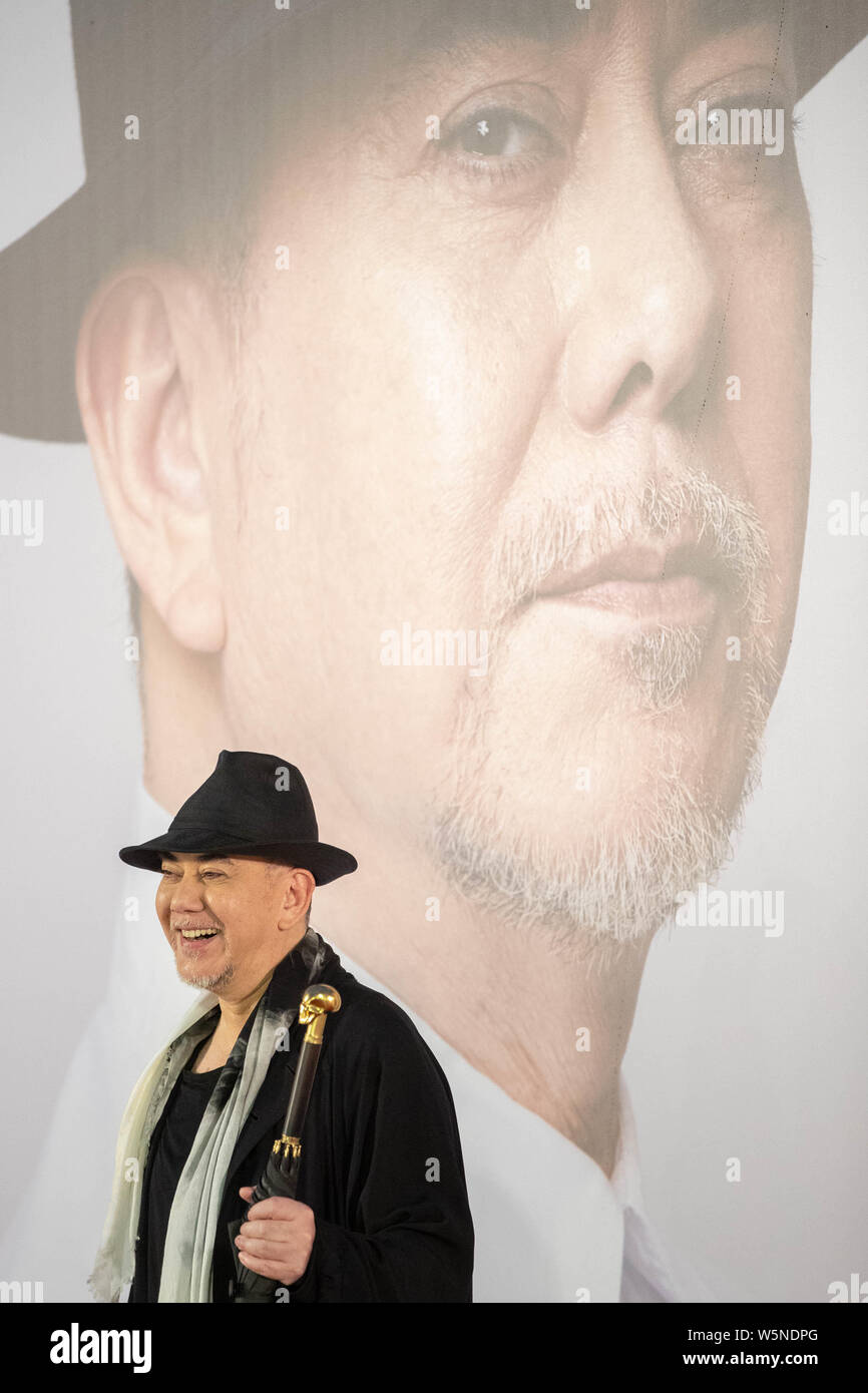 Hong Kong actor Anthony Wong poses with his trophy after winning "Best ...