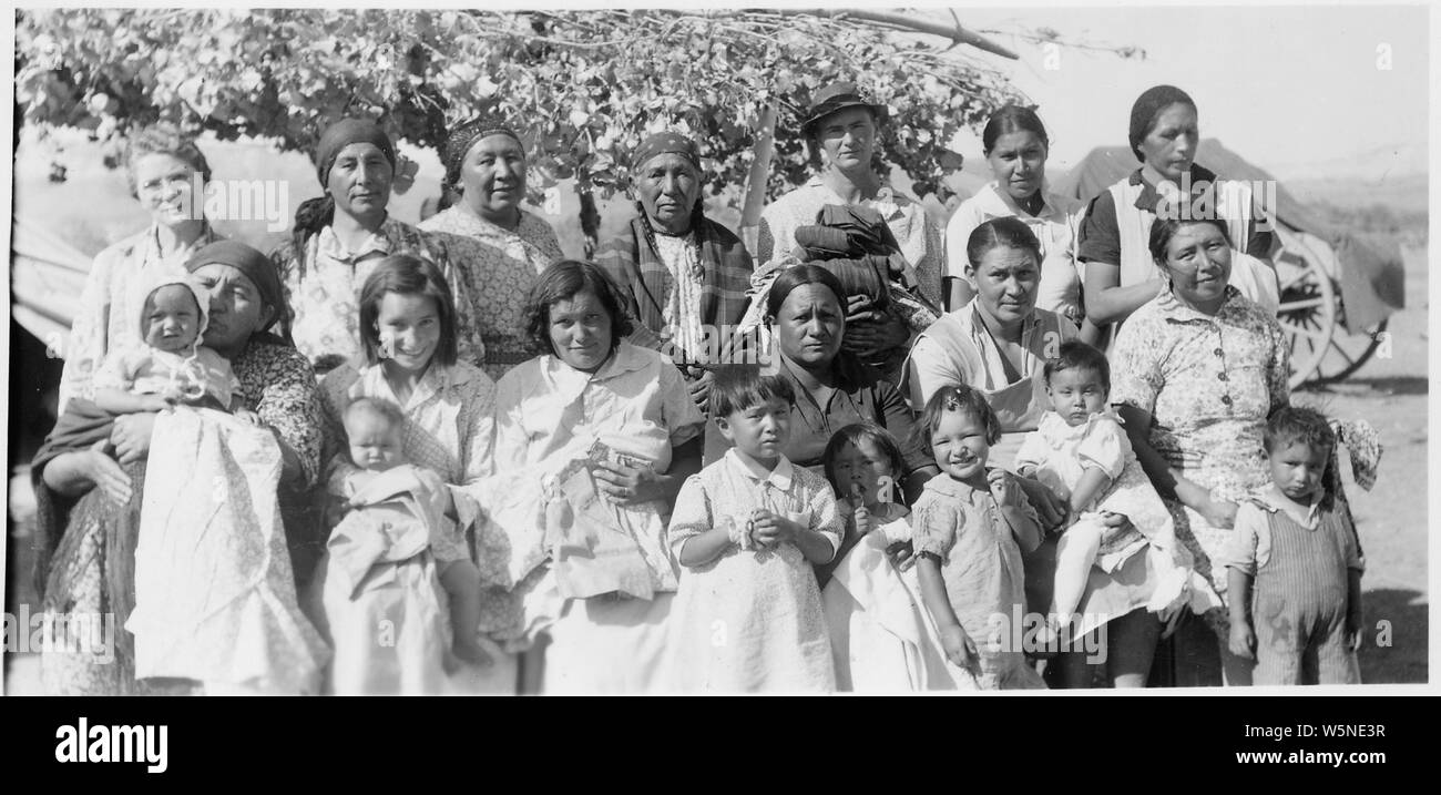Group photo of part of Red Shirt Table Auxillary Stock Photo - Alamy