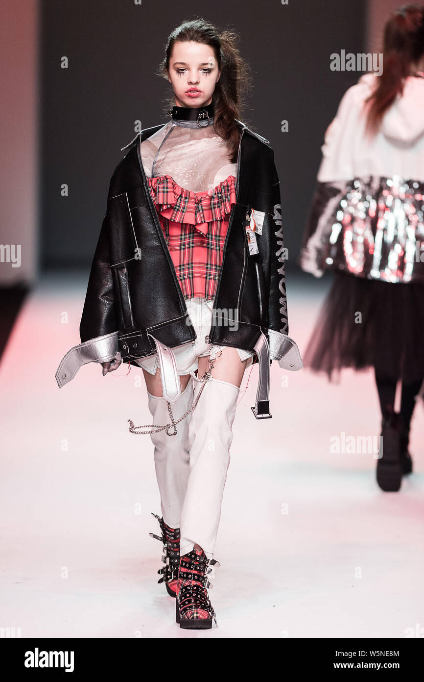 A model displays a new creation at the Devil Beauty show during the ...