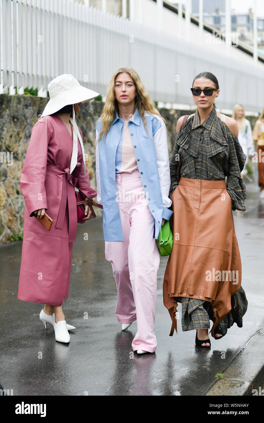 A trendy woman poses for street snaps during the Paris Fashion Week ...