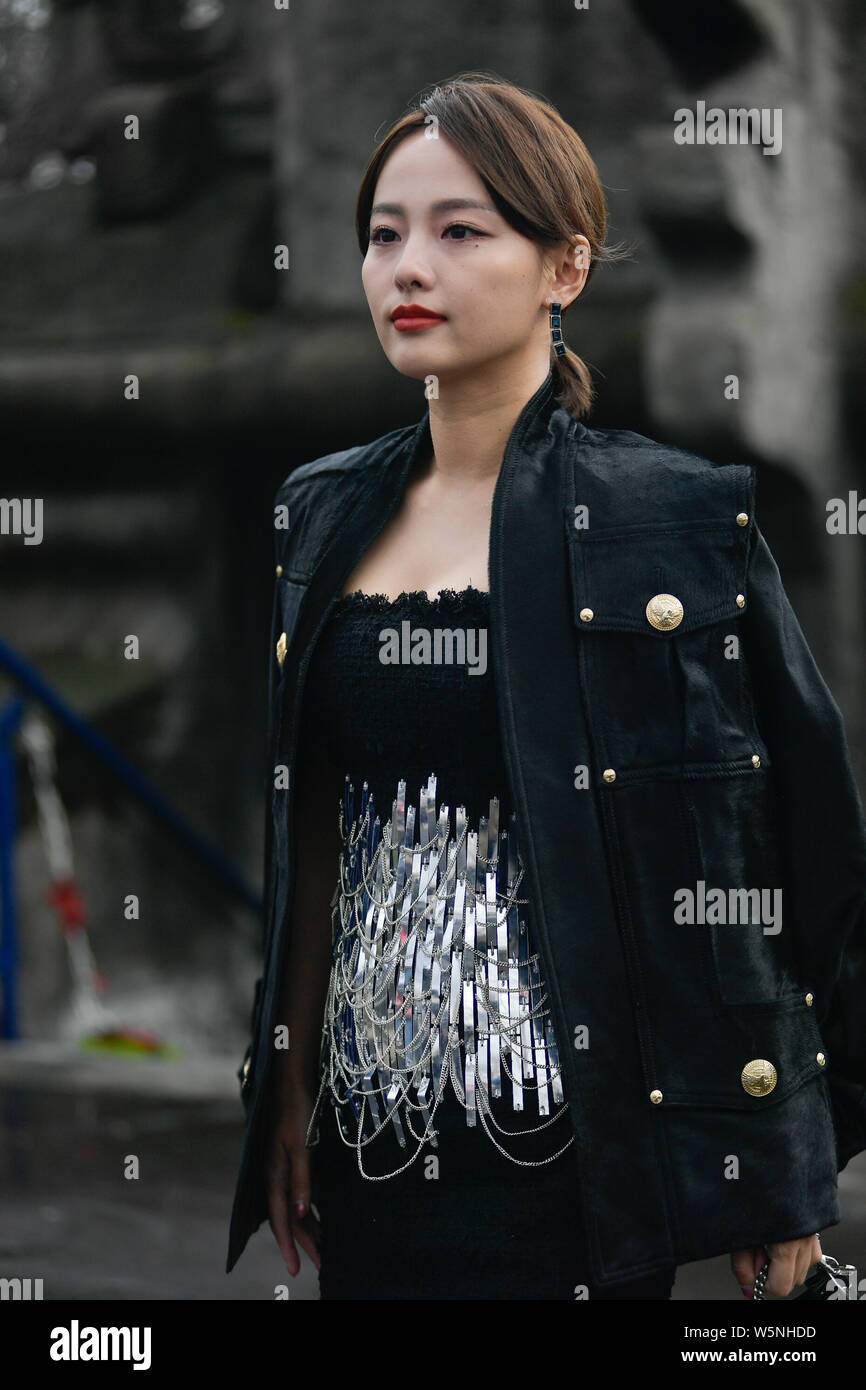 Chinese actress and singer Jenny Zhang or Zhang Jiani poses for street ...