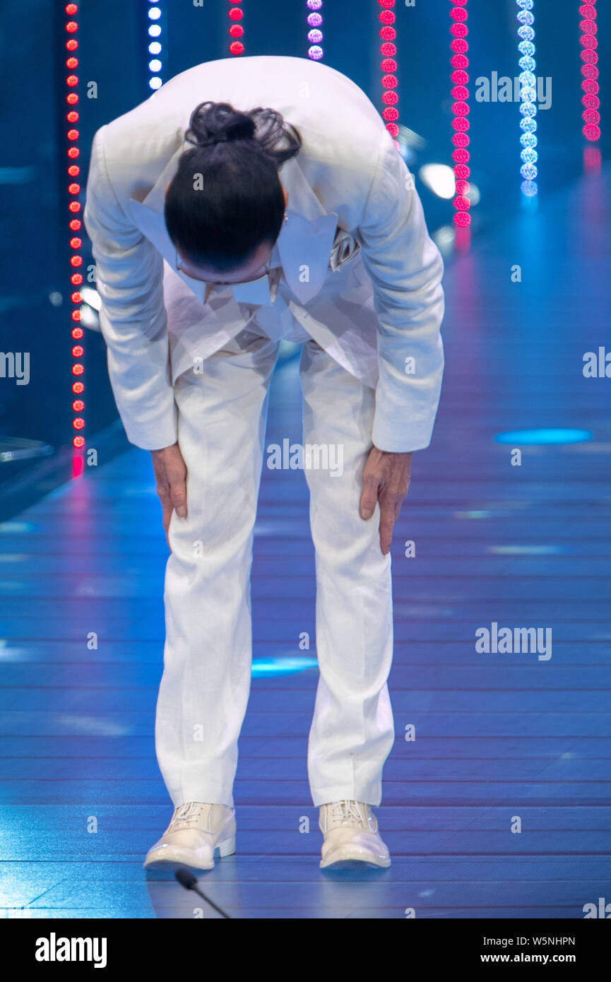 Hong Kong actor and producer Patrick Tse poses after winning the ...