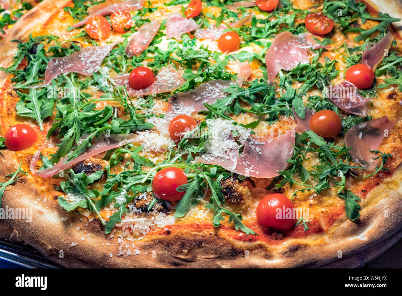 Pizza on a shop window, close-up Stock Photo - Alamy