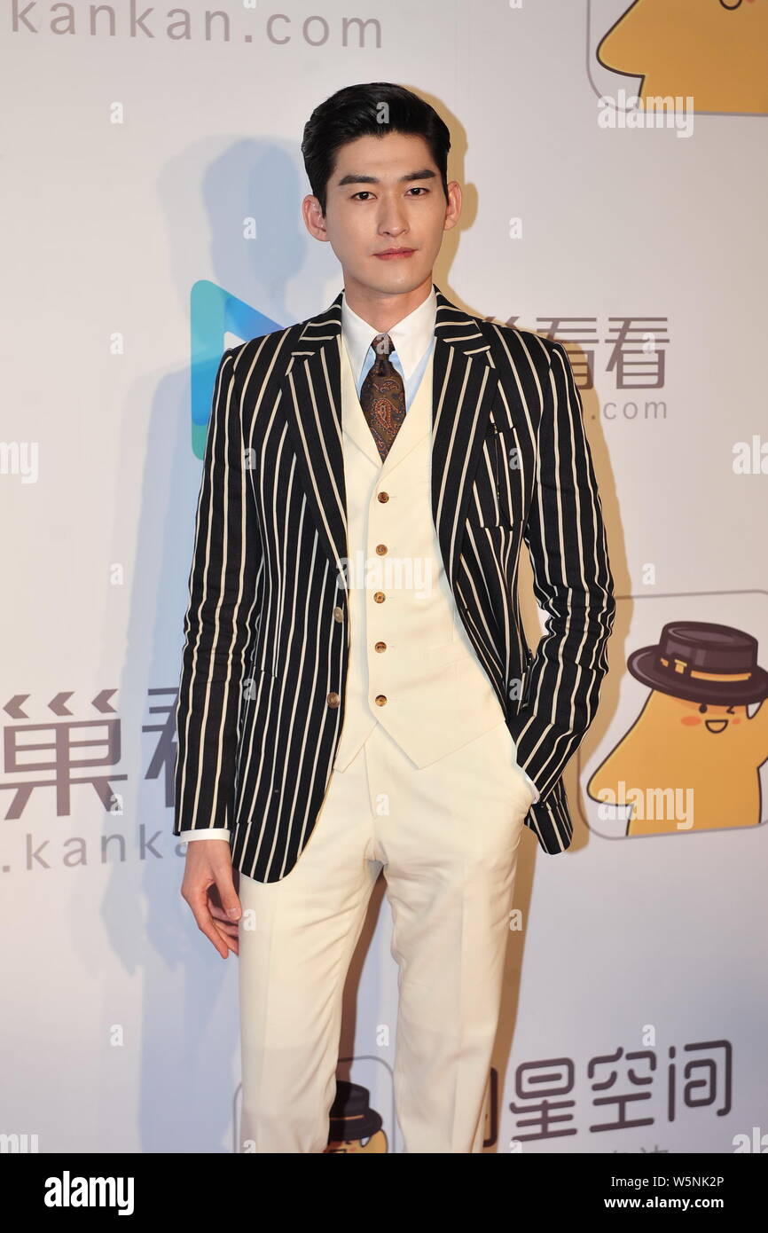 --FILE--Chinese actor Zhang Han arrives on the red carpet for a launch ...