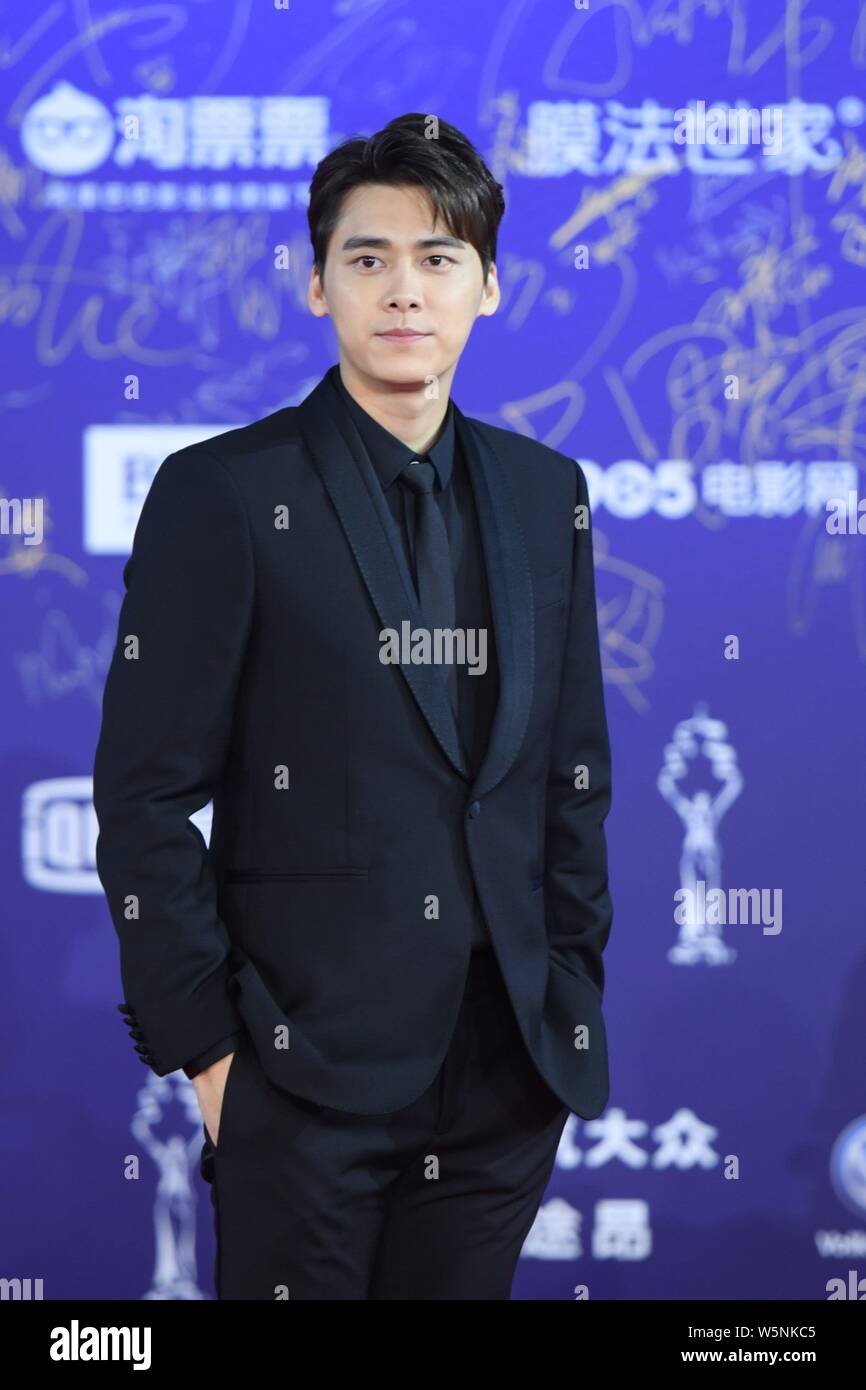 Chinese actor Li Yifeng arrives on the red carpet for the closing and ...