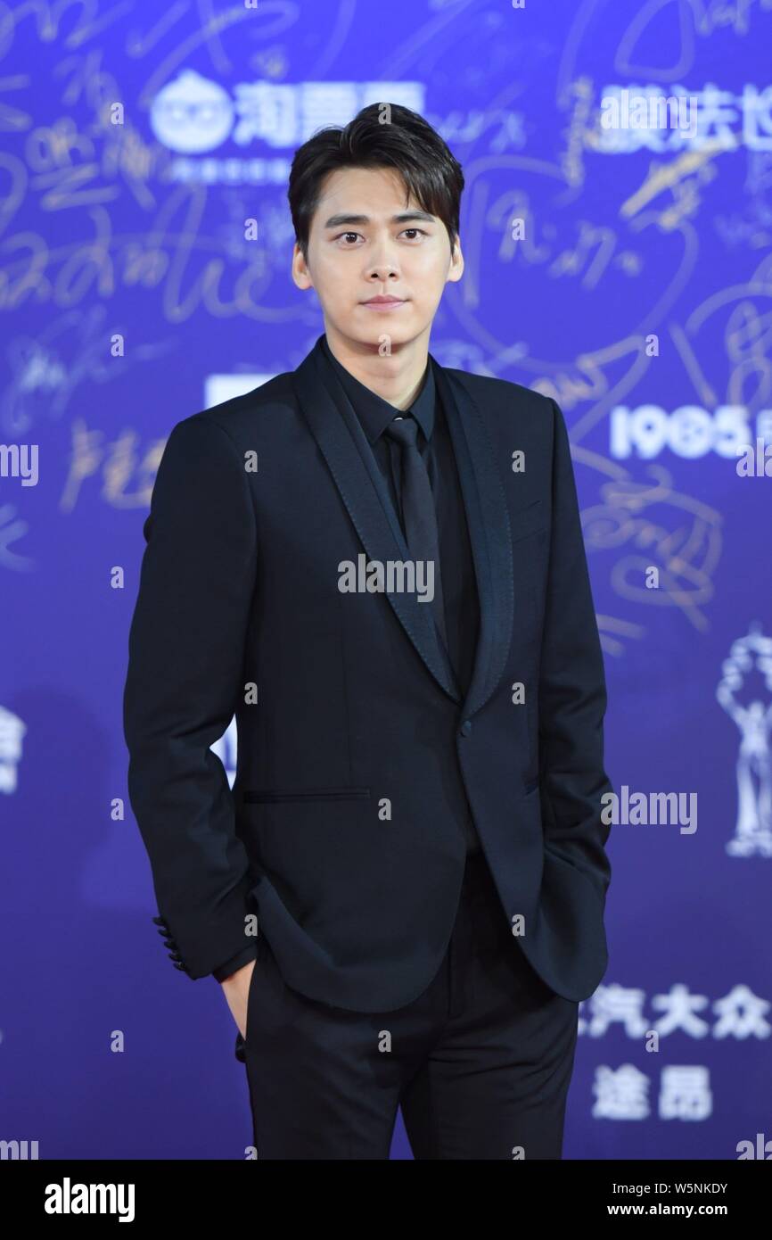 Chinese actor Li Yifeng arrives on the red carpet for the closing and ...