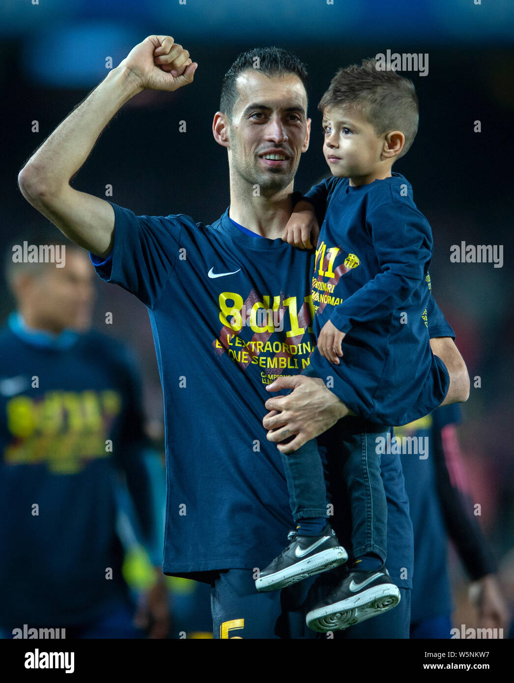 Sergio Busquets of FC Barcelona celebrates with his son after his team ...