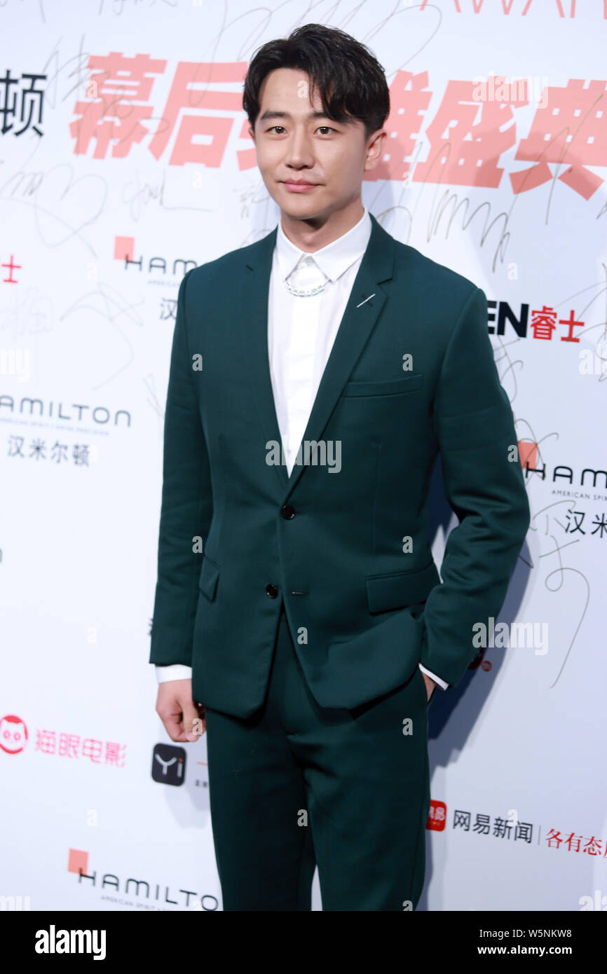 --FILE--Chinese actor Huang Xuan arrives for a fashion event in ...