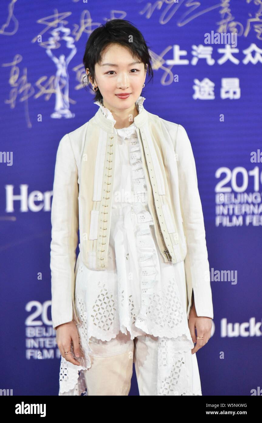 Chinese actress Zhou Dongyu poses as she arrives on the red carpet for ...
