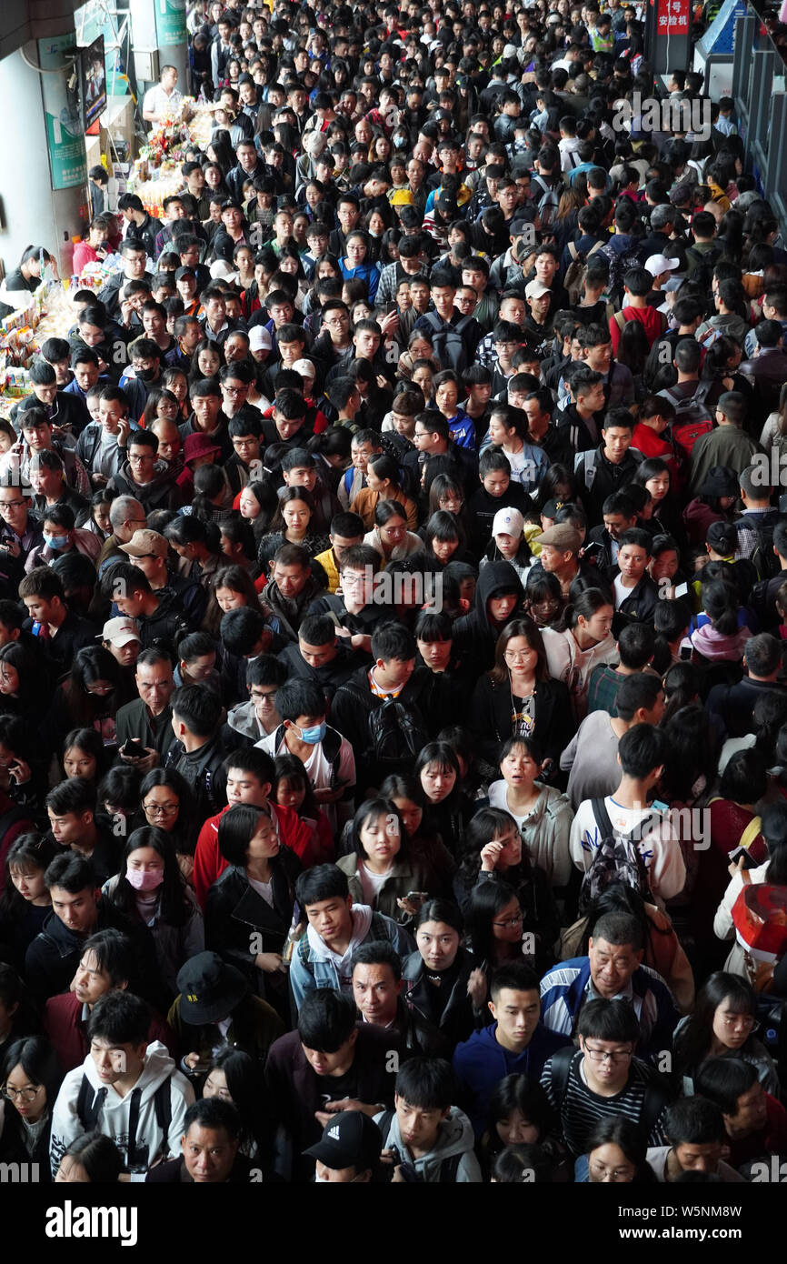 Passengers crowd the Langdong coach station as they are going back home ...