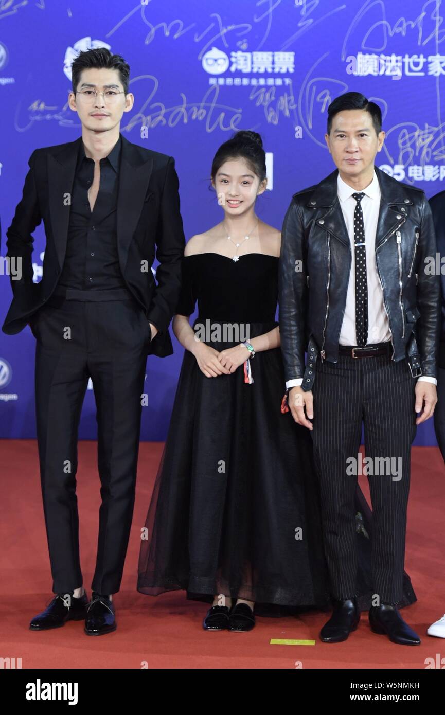Hong Kong actor Nick Cheung, right, and Chinese actor Zhang Han arrive ...