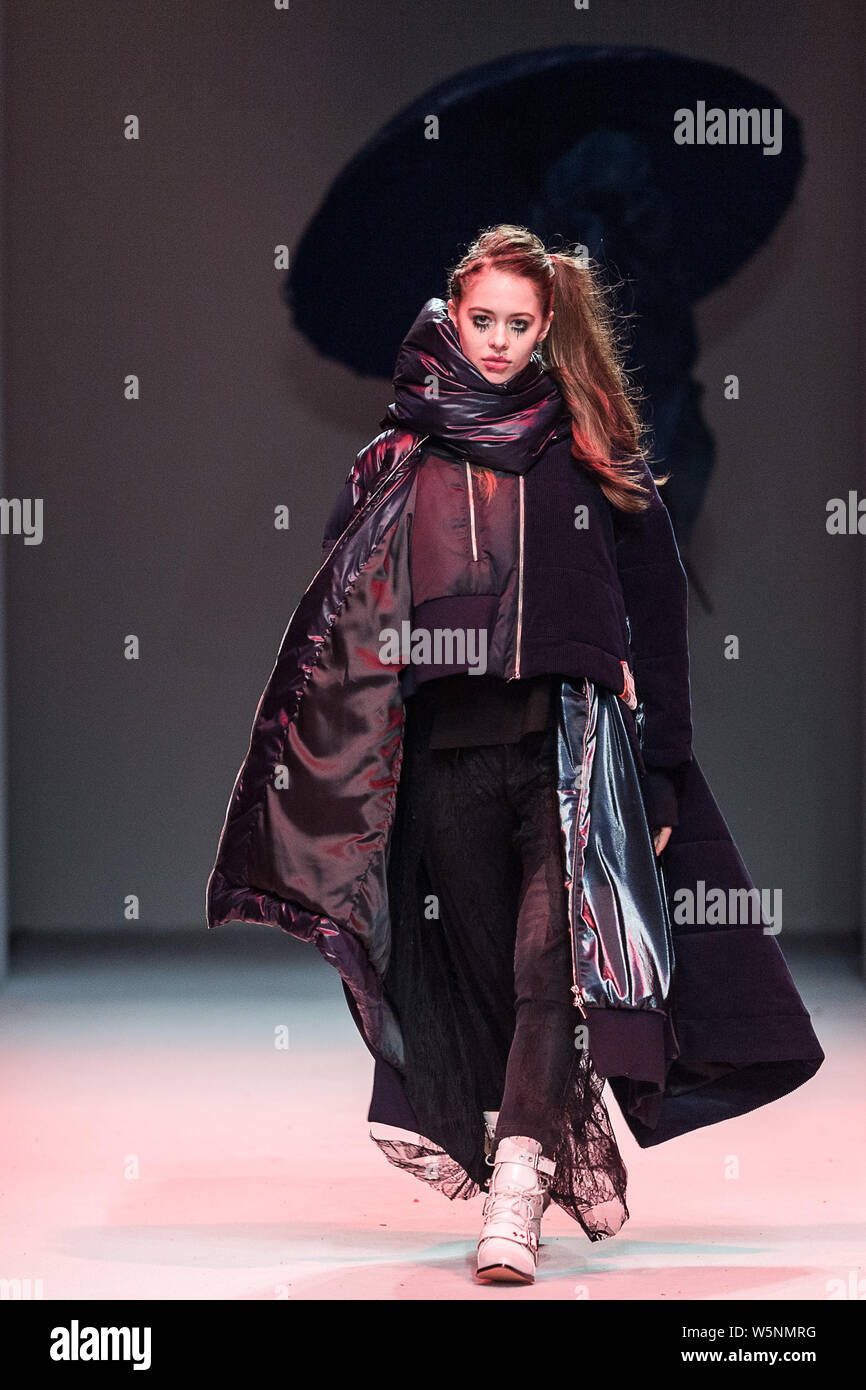 A model displays a new creation at the Devil Beauty show during the ...