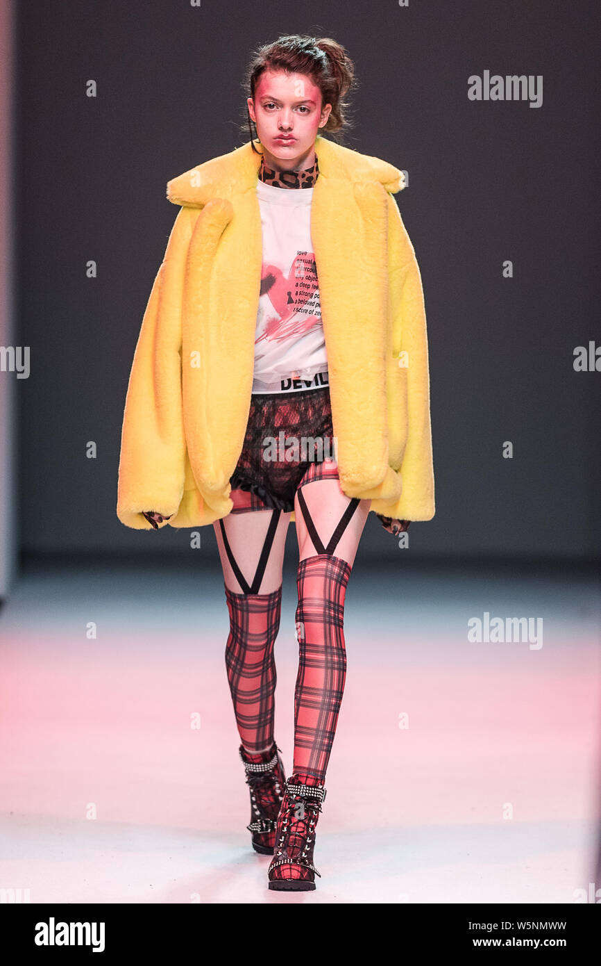 A model displays a new creation at the Devil Beauty show during the ...