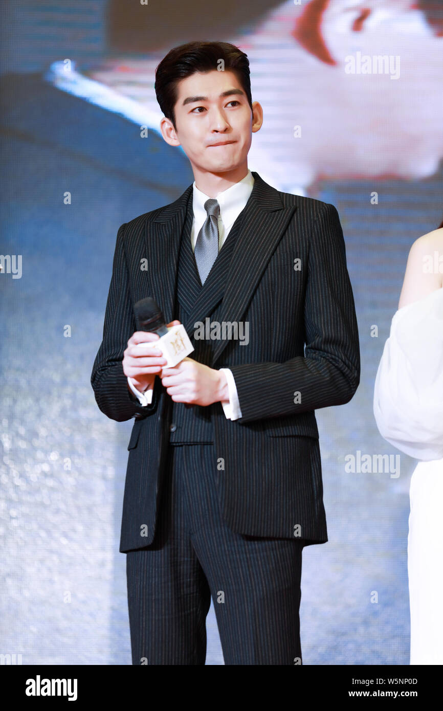 --FILE--In this handout picture, Chinese actor Zhang Han attends a ...