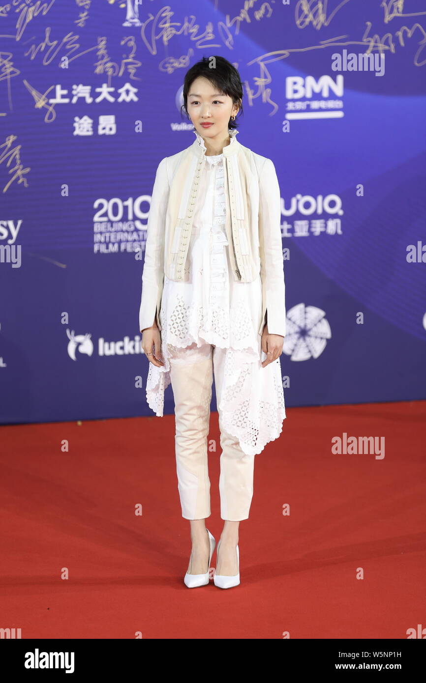 Chinese actress Zhou Dongyu poses as she arrives on the red carpet for ...