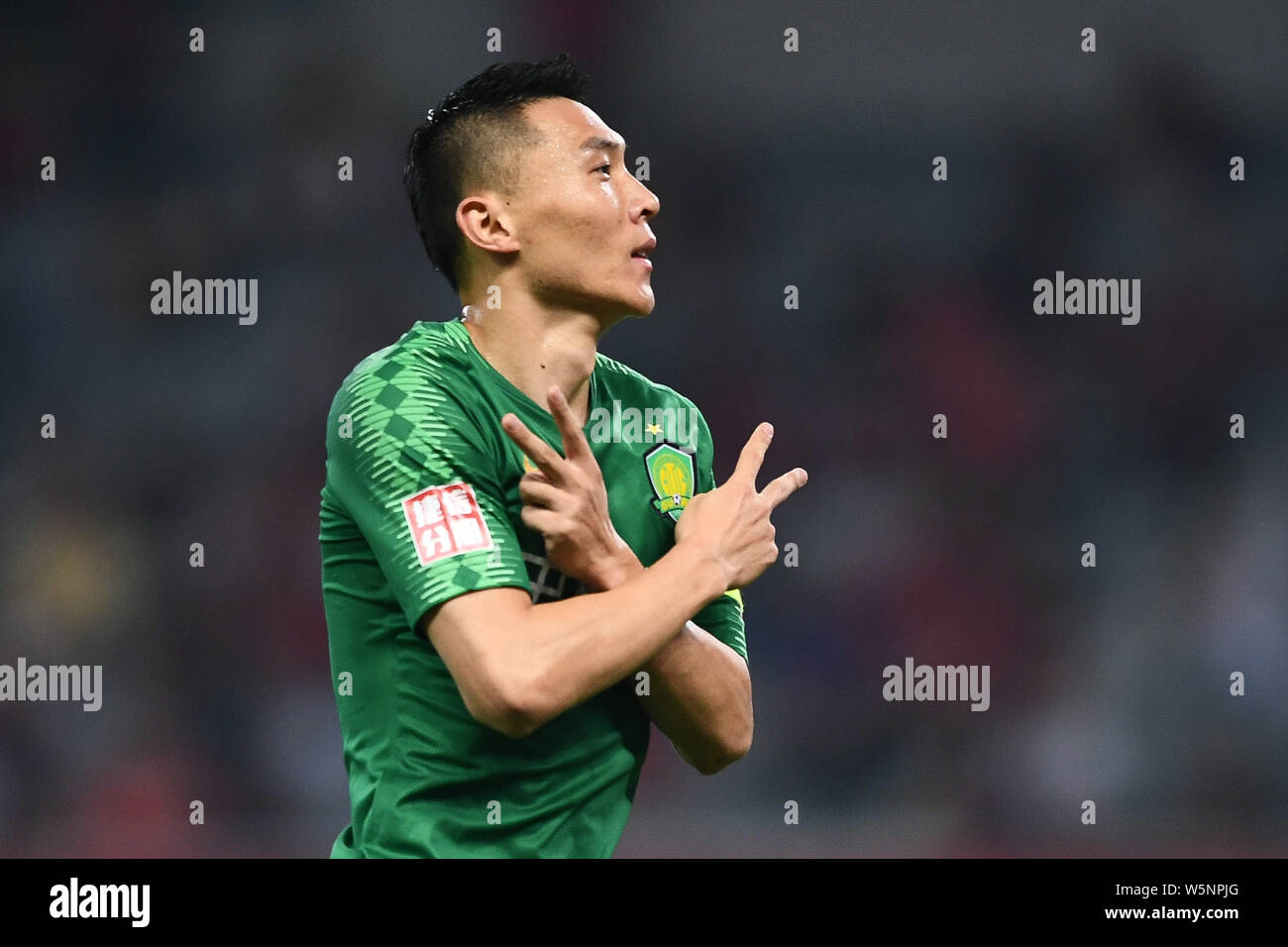 Yu Dabao of Beijing Sinobo Guoan celebrates after scoring against ...