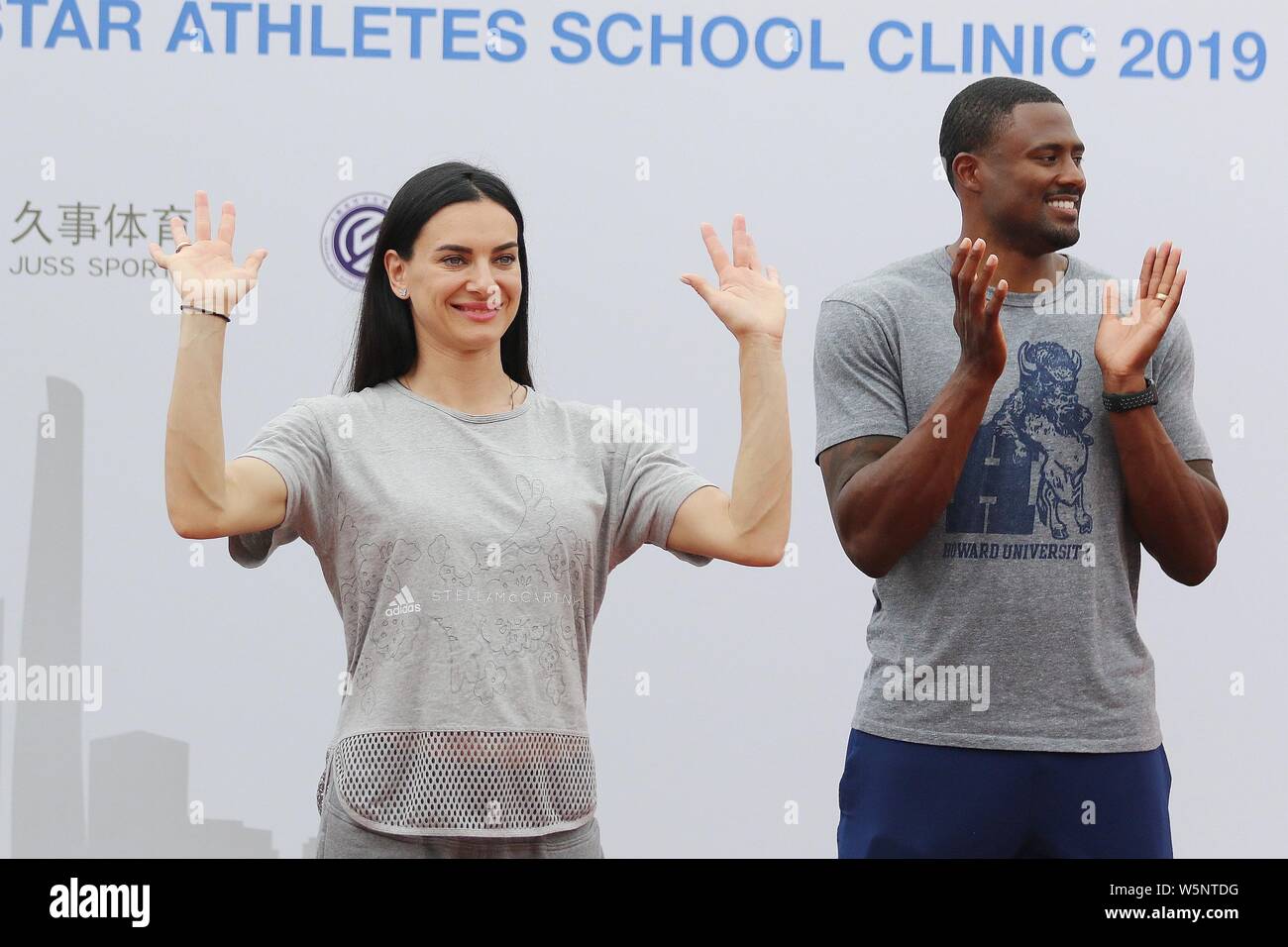 American retired hurdling athlete David Oliver, right, and Russian ...