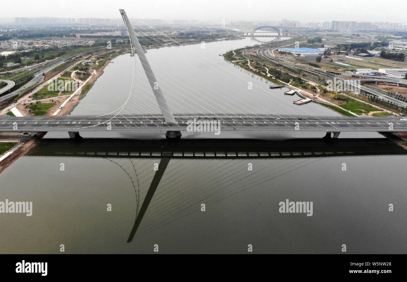 Aerial view of the Yingbin bridge featuring the theme of flying dragon ...