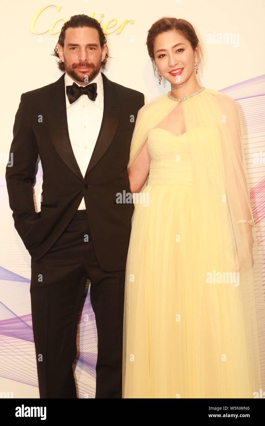 Hong Kong Model Kathy Chow Right Attends A Promotional Event For Cartier In Hong Kong China