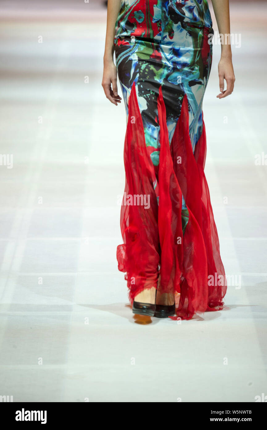 A model dressed in Cheongsam, a traditional Chinese dresses also known ...