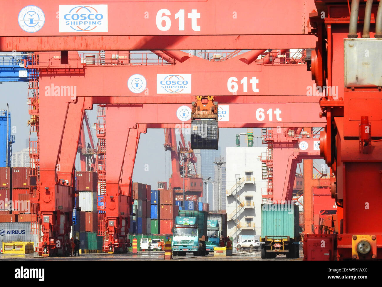 Crane vehicle lifts container hi-res stock photography and images - Alamy