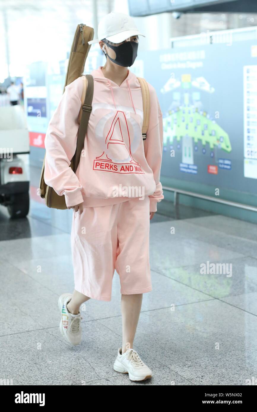 Chinese singer Chris Lee or Li Yuchun arrives at the Beijing Capital ...