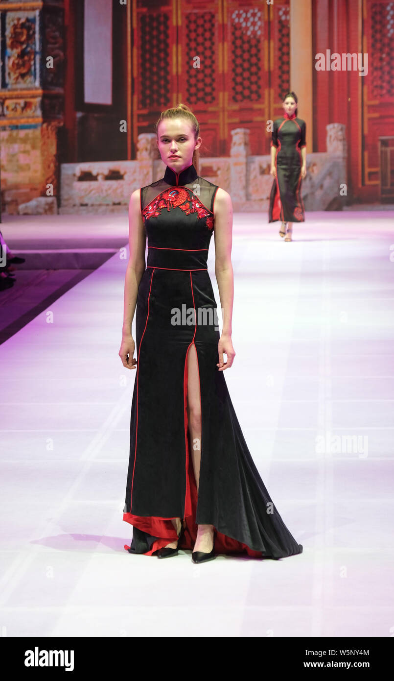 A model dressed in Cheongsam, a traditional Chinese dresses also known ...