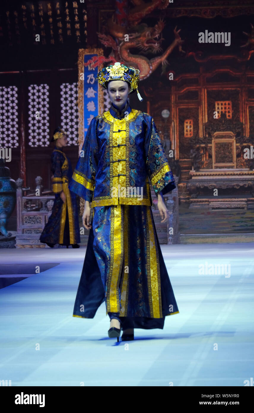 A model dressed in Cheongsam, a traditional Chinese dresses also known ...