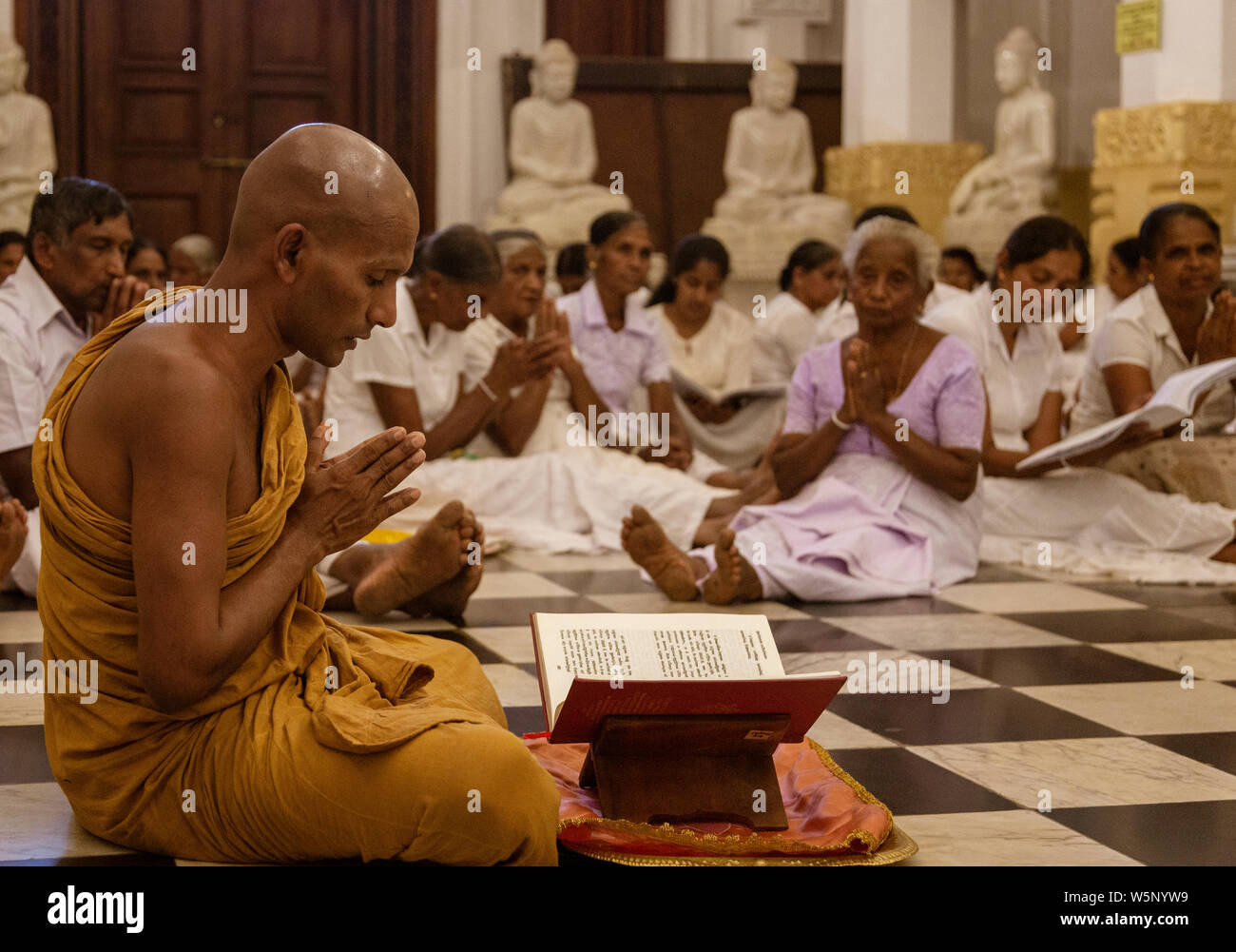 Man meditating in monastery hi-res stock photography and images - Alamy