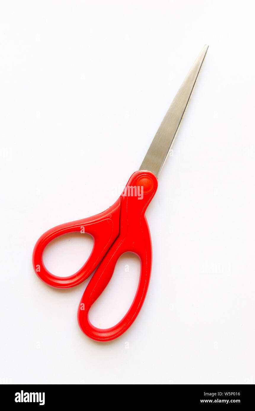 Sissors cutting paper hi-res stock photography and images - Alamy