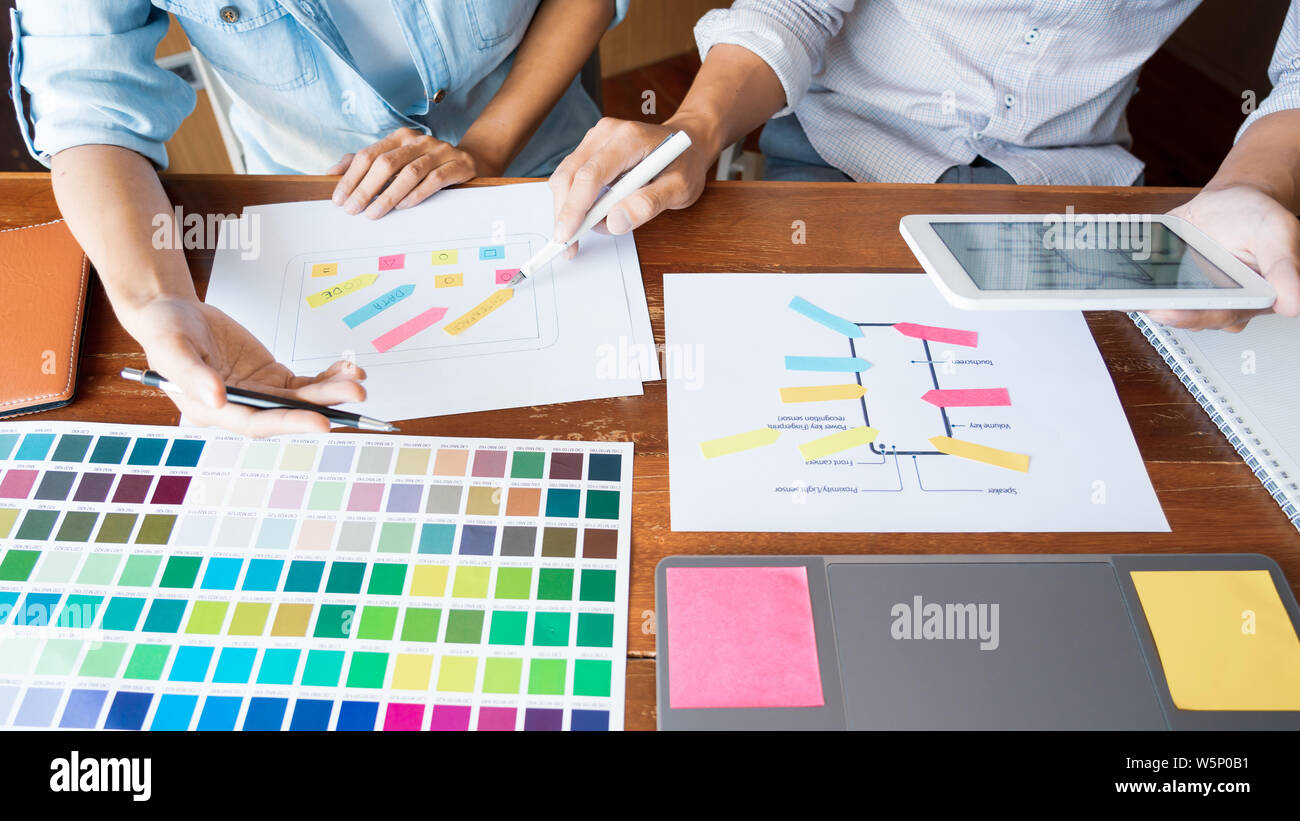 business technology concept, creative team designer choosing samples ...