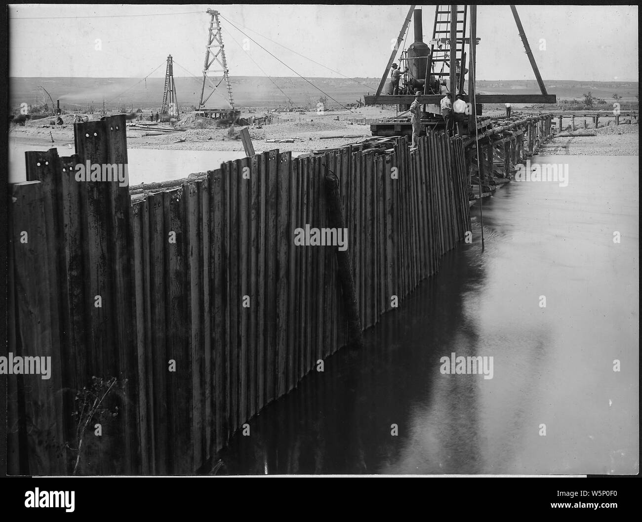 Interstate Canal. Driving sheet steel piling for coffer dam at the ...