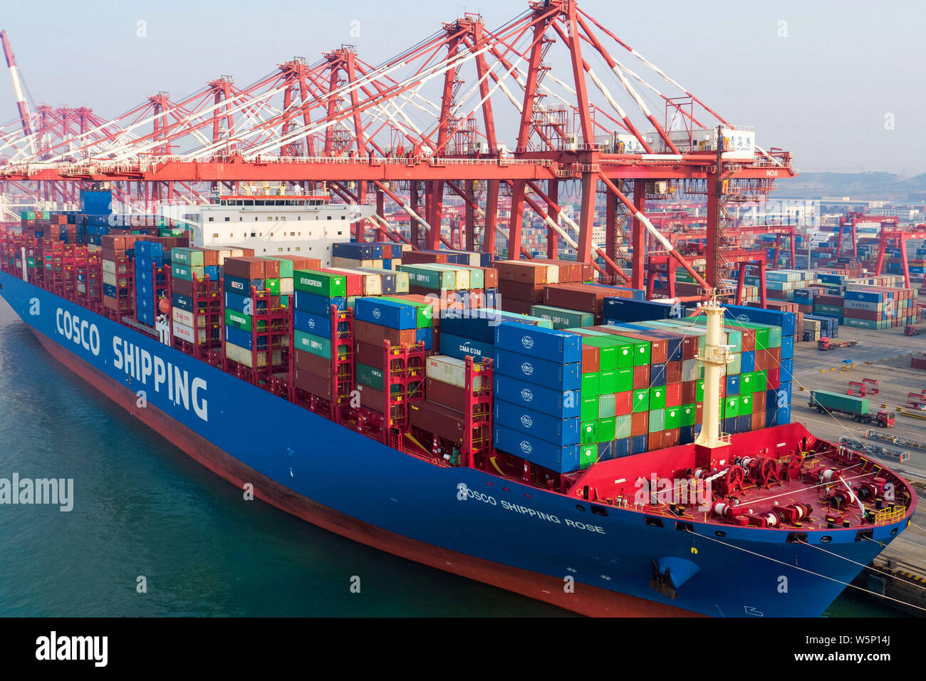 --FILE--A cargo ship of COSCO Shipping loaded with containers to be ...
