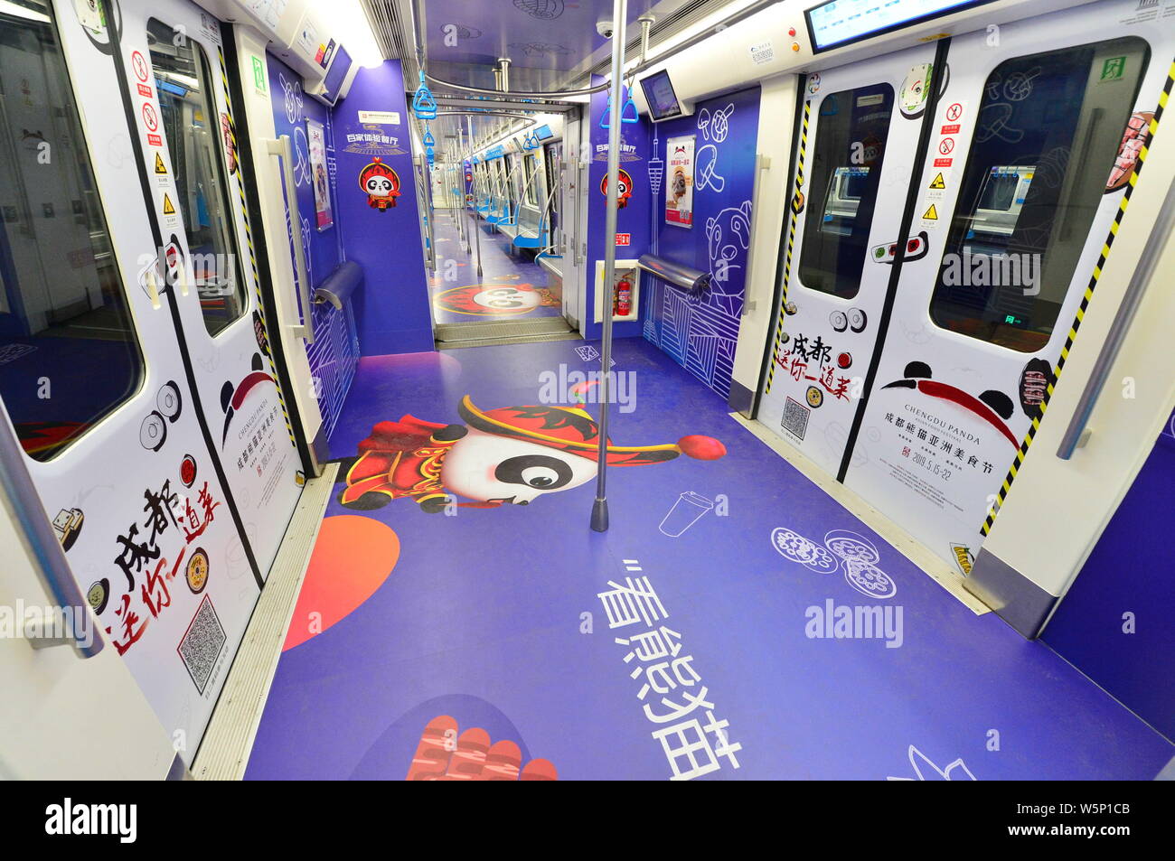 Interior view of a subway train on the Metro Line 1 featuring giant ...