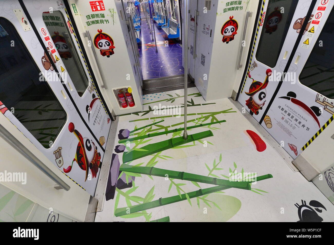 Interior view of a subway train on the Metro Line 1 featuring giant ...