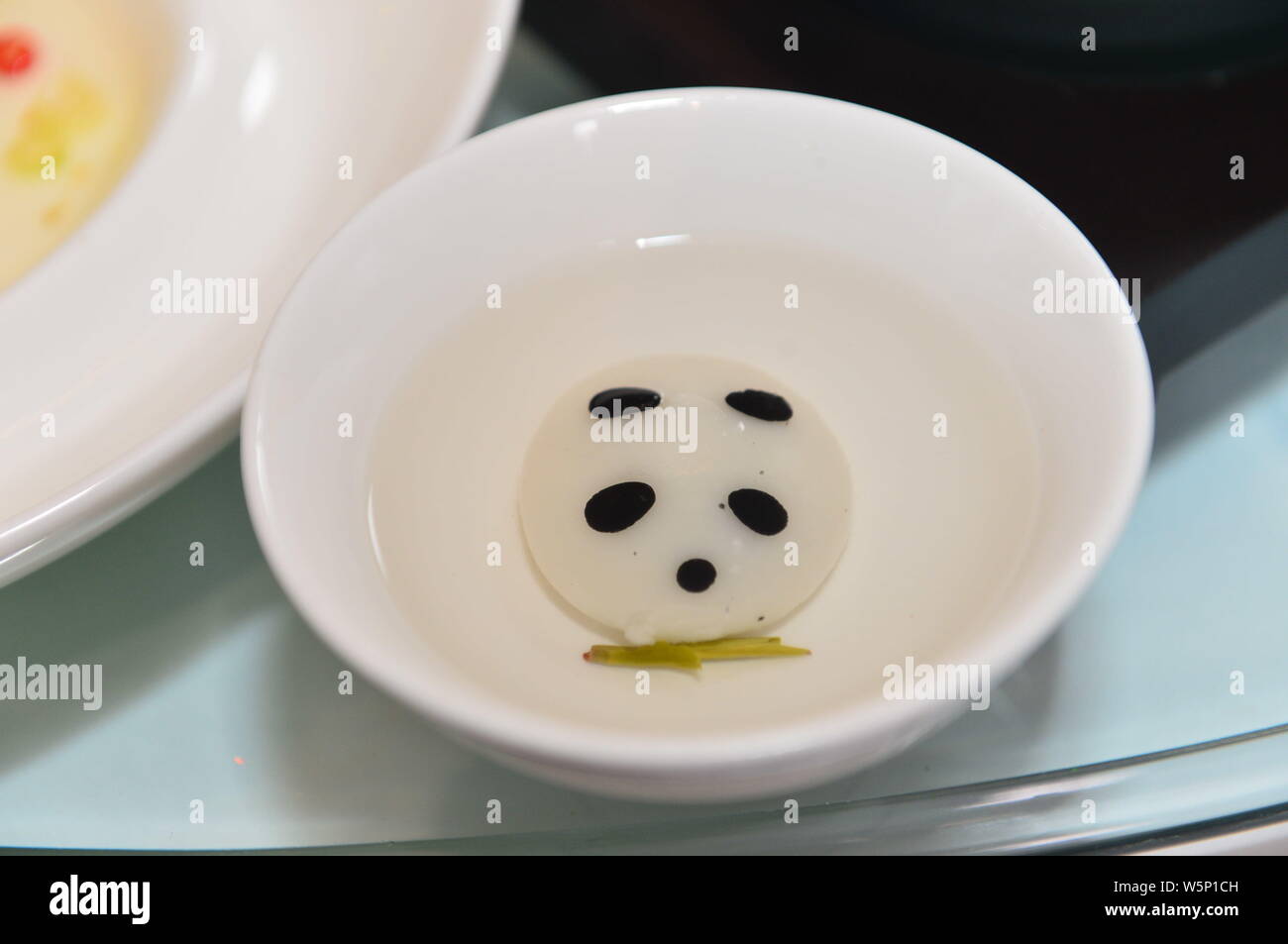 Desserts featuring shape of giant panda are served for visitors during ...