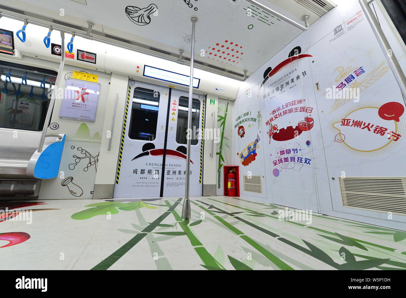 Interior view of a subway train on the Metro Line 1 featuring giant ...