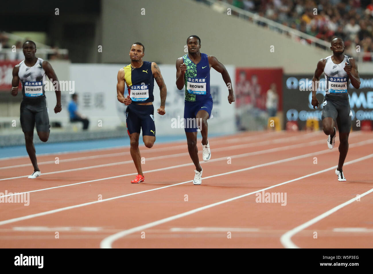 Canadian sprinter Aaron Brown, center, competes in the 200m Men during ...