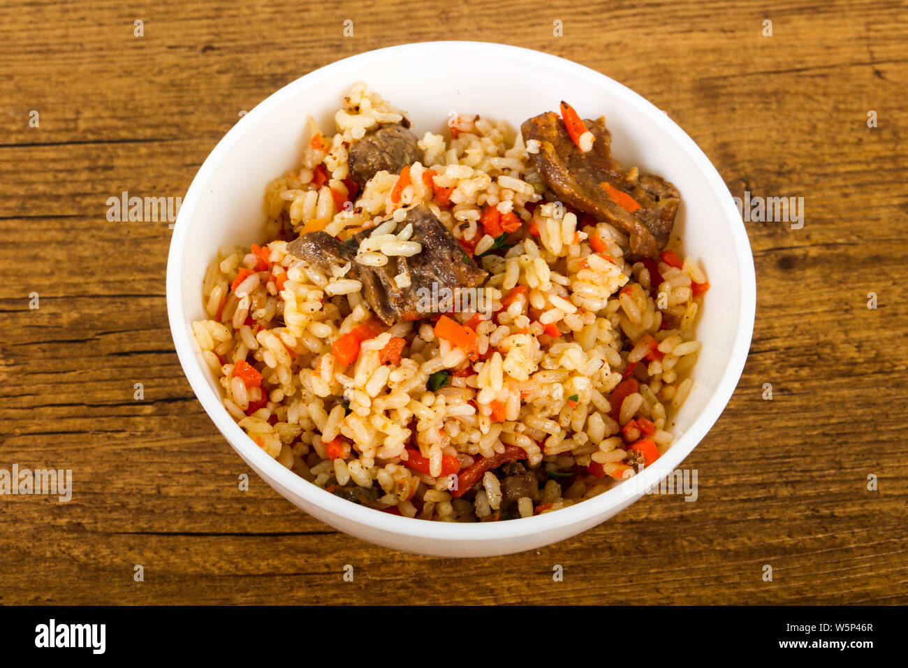 Asian rice - Plov with meat and carrot Stock Photo - Alamy