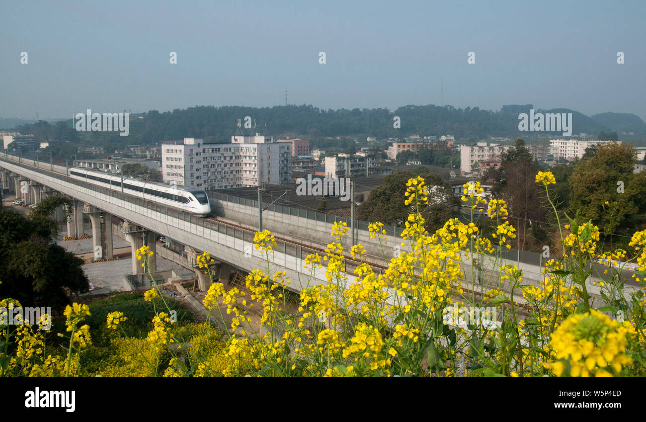 --FILE--A CRH (China Railway High-speed) bullet train runs on the ...