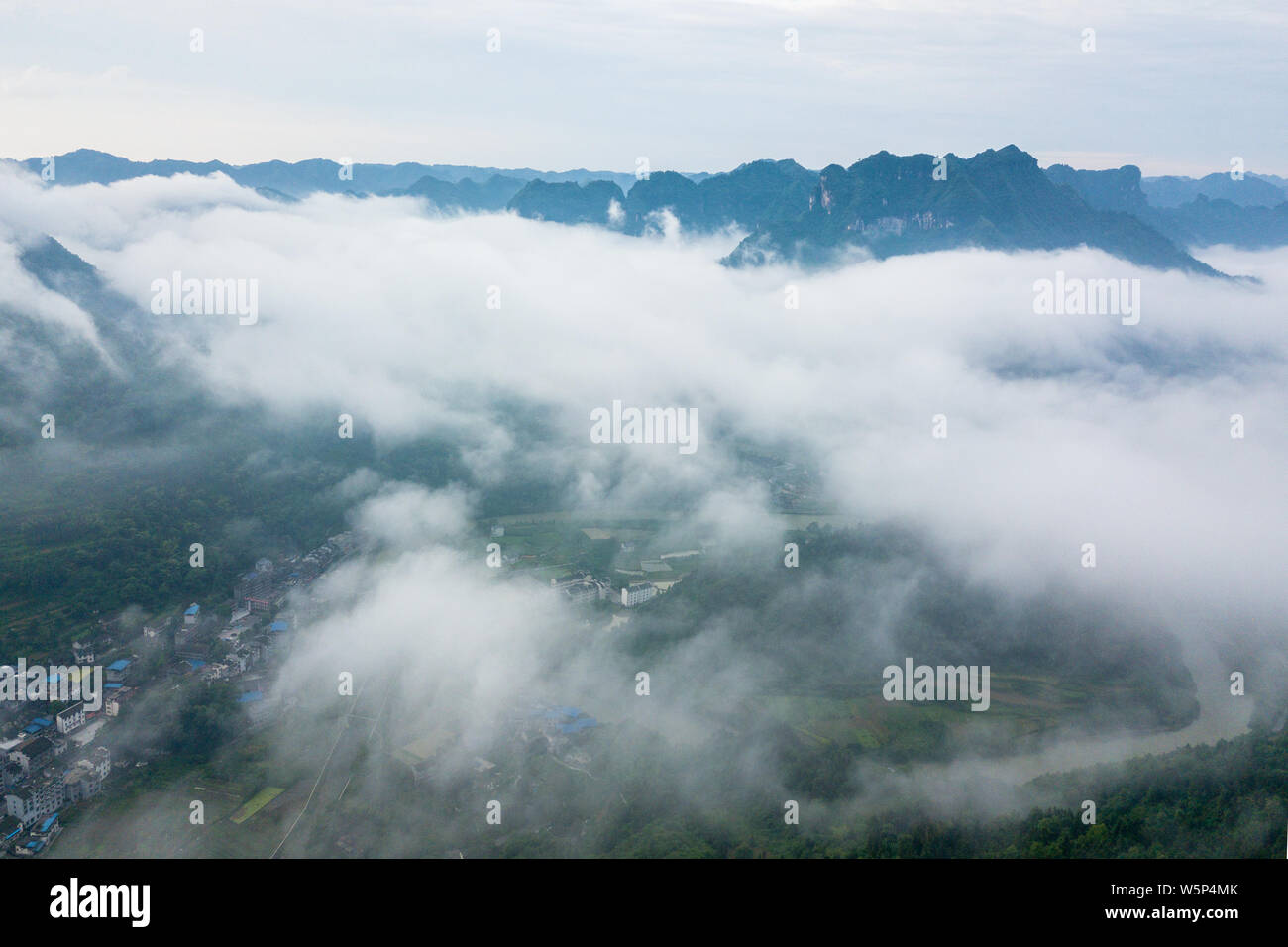 Aerial view of the mountains embraced by a "sea of clouds" after a ...