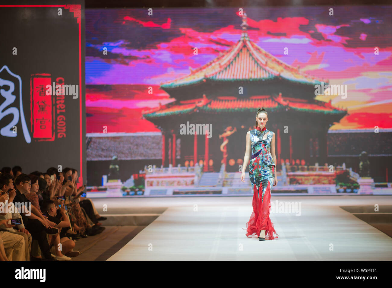 A model dressed in Cheongsam, a traditional Chinese dresses also known ...