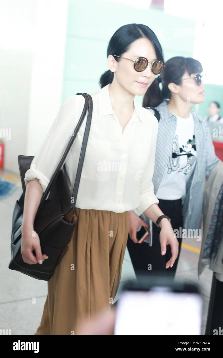 Chinese actress Faye Yu or Yu Feihong arrives at the Beijing Capital ...