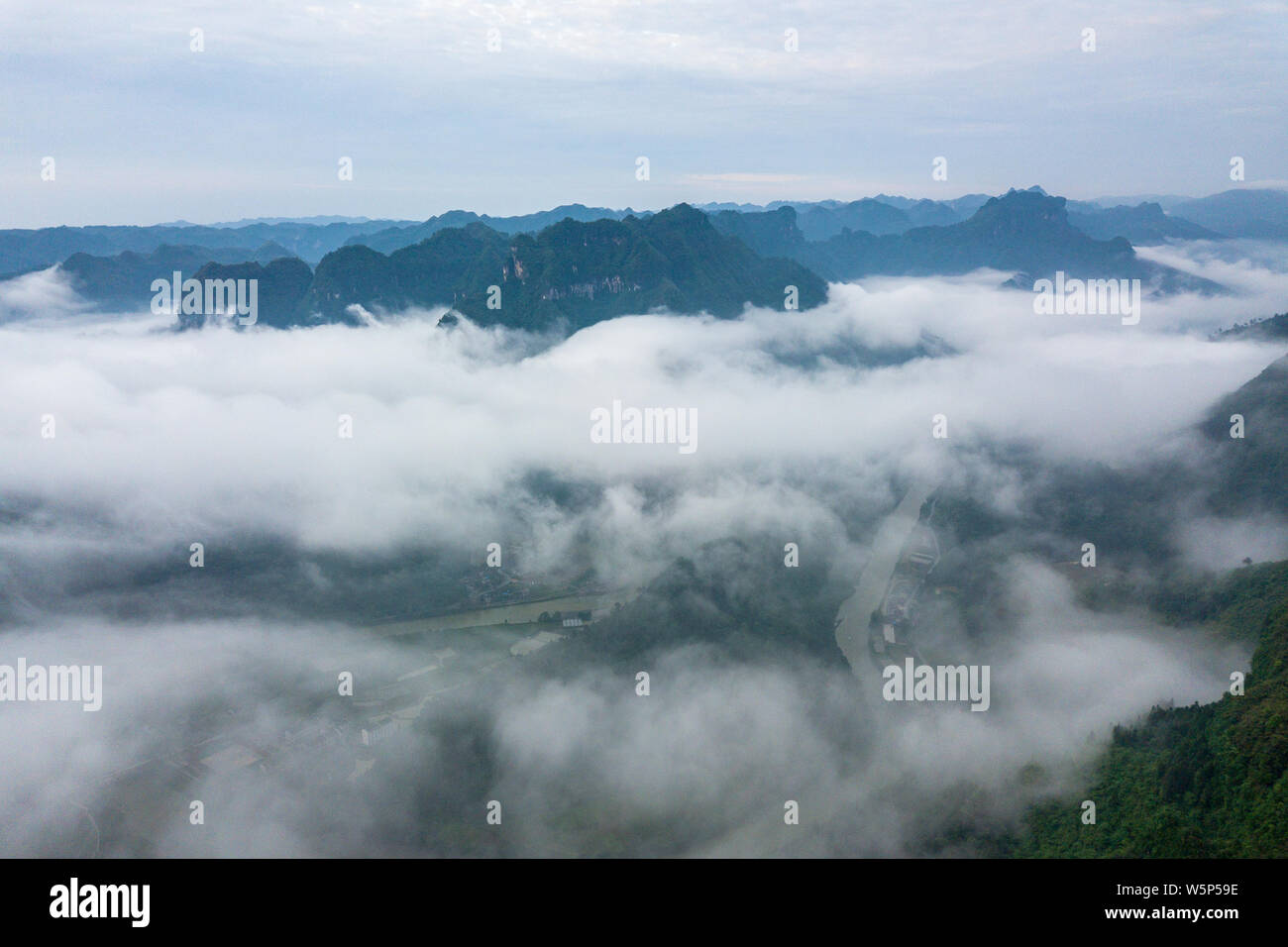 Aerial view of the mountains embraced by a "sea of clouds" after a ...