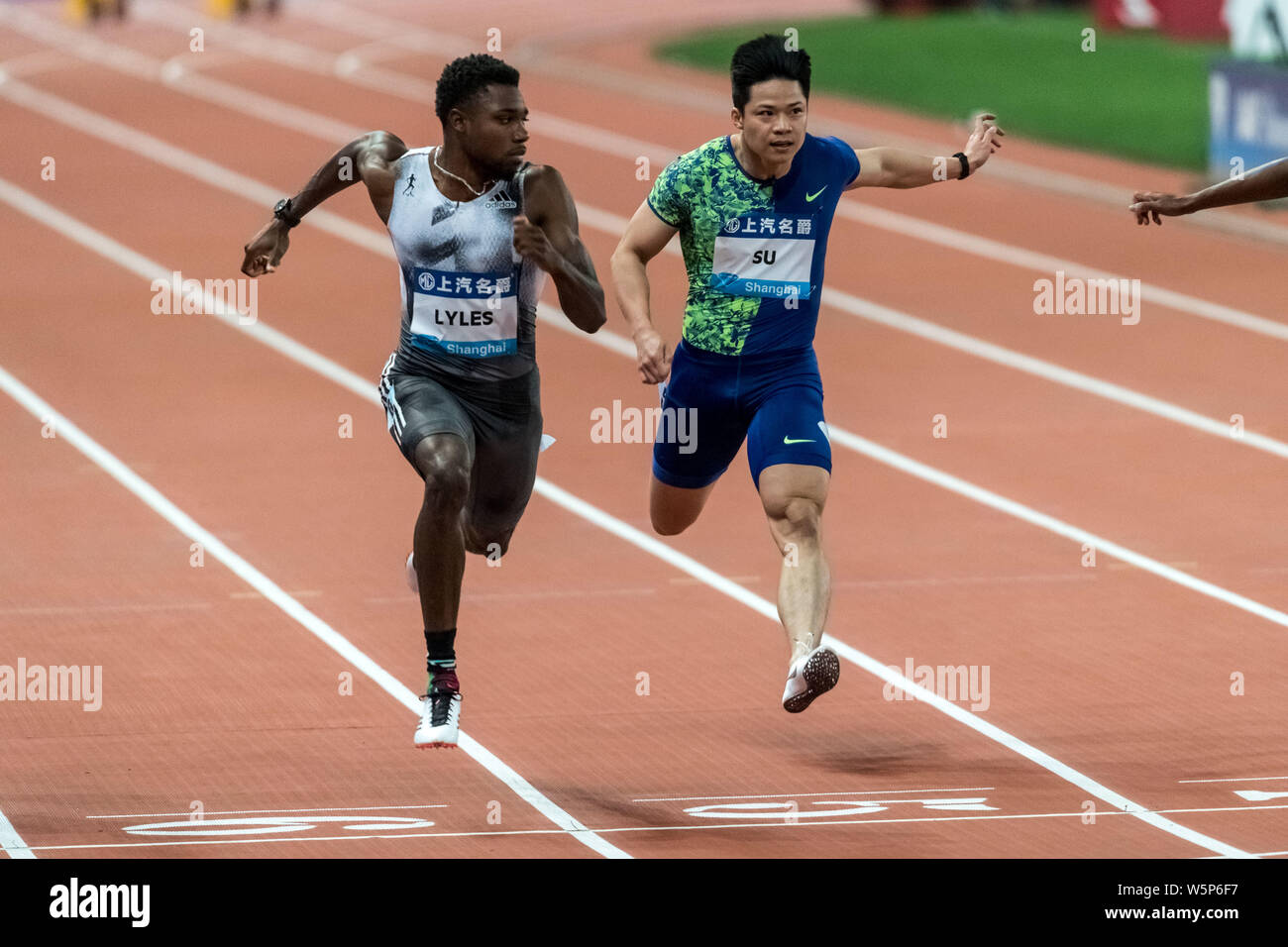 American professional track and field athlete Noah Lyles, left, and ...