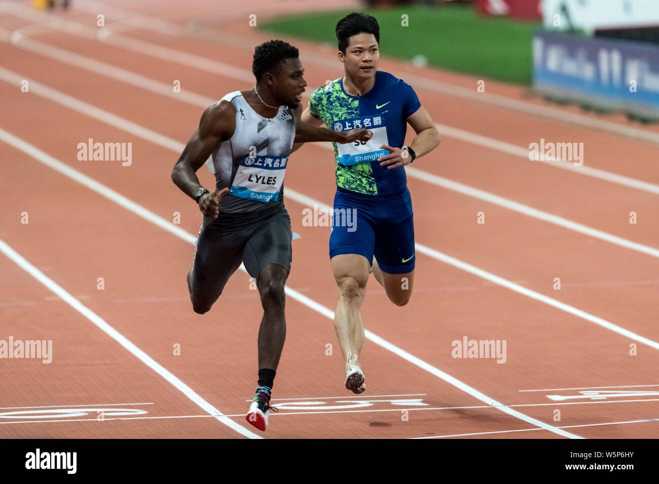 American professional track and field athlete Noah Lyles, left, and ...