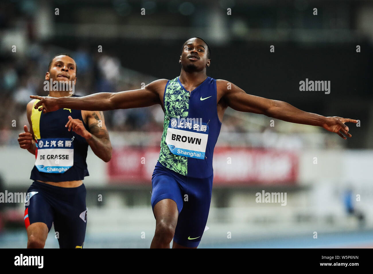 Canadian sprinter Aaron Brown celebrates after winning the 200m Men ...