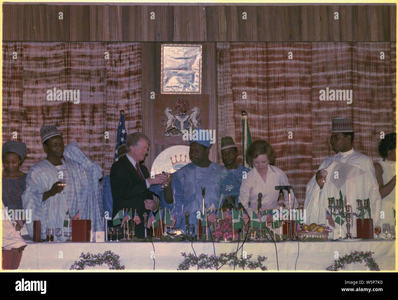 Jimmy Carter and President William Tolbert of Liberia engage in a toast ...