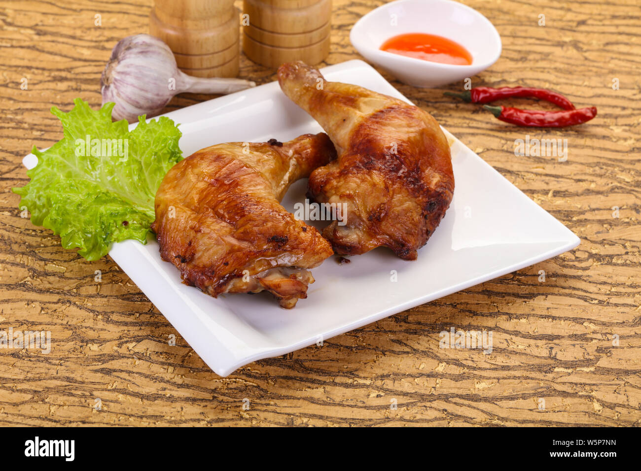 Crispy tasty Roasted chicken leg Stock Photo - Alamy