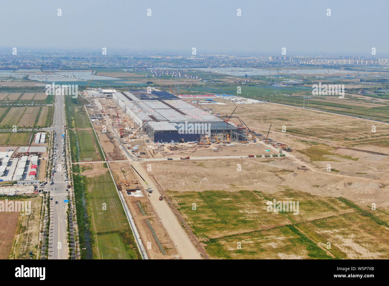 Aerial view of the Tesla Shanghai Gigafactory under construction in ...